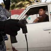Single Iraqi Checkpoint Seeks Bomb for Not Exploding and Maybe More